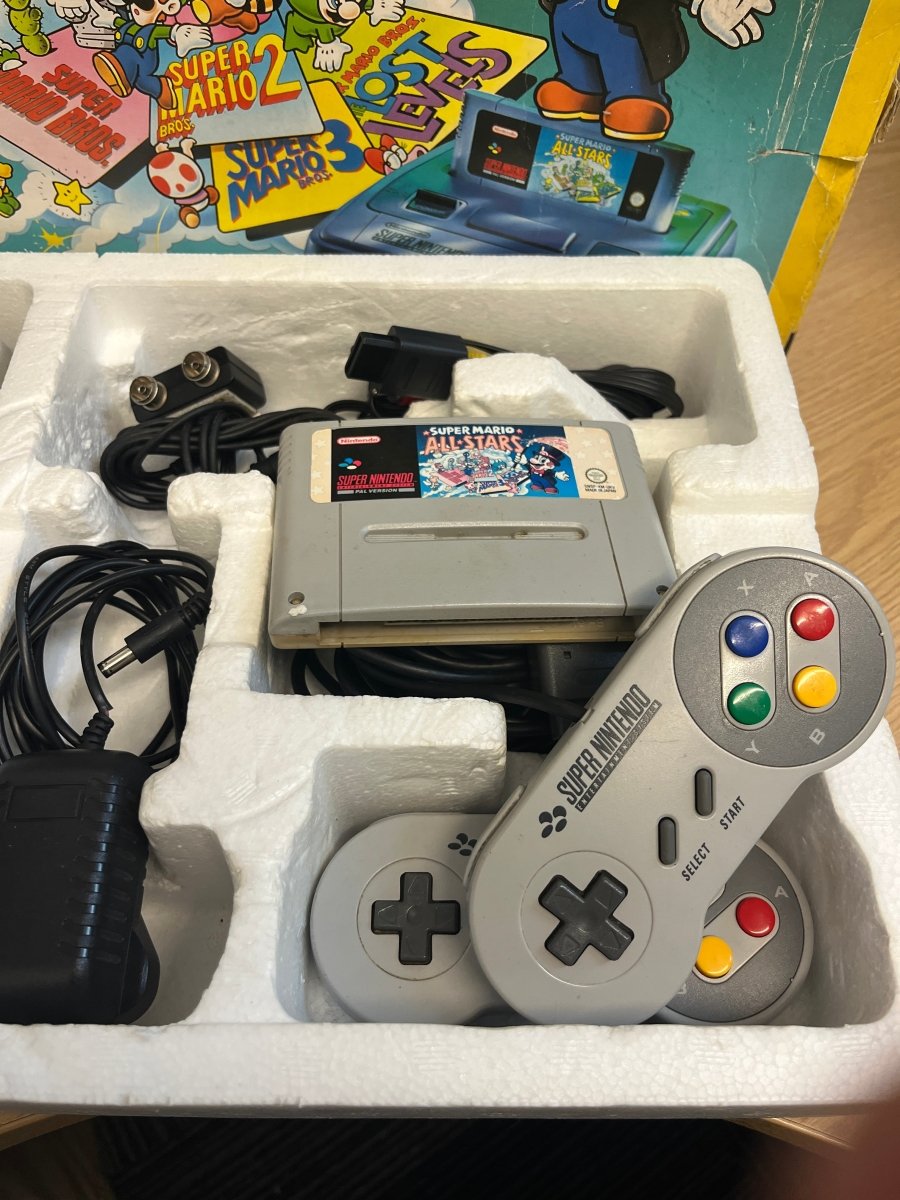Super Nintendo Yellow all stars boxed console 99.99 8BitBeyond – retro ...